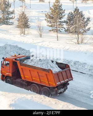 Cleaning and cleaning of roads in the city from snow in winter Stock ...