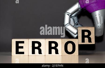 Error word written on cube shape wooden blocks on wooden table Stock ...