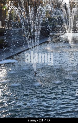 Water stream splashing on ground Stock Photo - Alamy