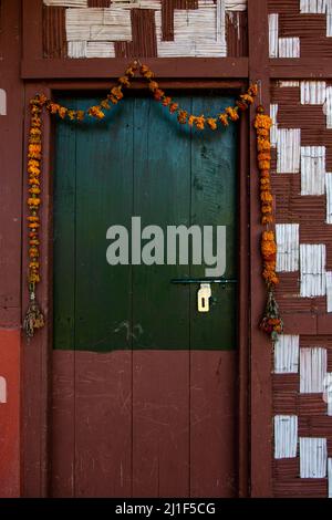 close up view of wooden decoration with white curtain lace, blue cloudy ...