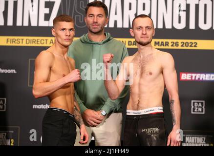 Cory O'Regan (left) and Jakub Laskowski face off as Eddie Hearn look on ...