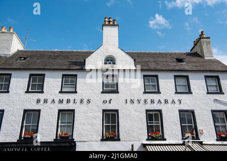 The exterior of a building with the text Brambles of Inveraray on the ...