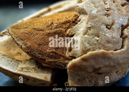 Natural split almonds in the foreground Stock Photo - Alamy