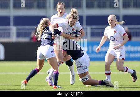 Scotland's Rachel Malcolm (centre) is tackled by Fiji's Manuqalo ...