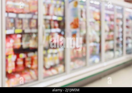 Frozen food section in supermarket blurred background, vintage tone ...