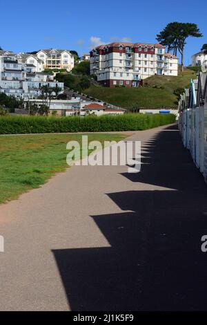 Shadows of beach huts at Goodrington Sands, South Devon Stock Photo - Alamy
