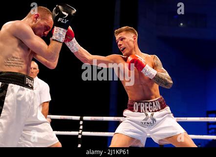 Cory O'Regan (right) in action against Jakub Laskowski during their ...