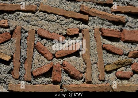 Stone and brick wall of Aghia Fotini a peculiar Christian church with ...