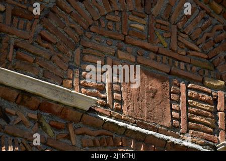Stone and brick wall of Aghia Fotini a peculiar Christian church with ...