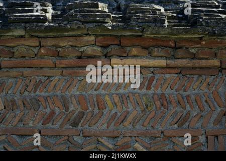Stone and brick wall of Aghia Fotini a peculiar Christian church with ...
