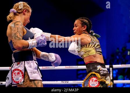 Maria Cecilia Roman (left) and Ebanie Bridges face off as Eddie Hearn ...