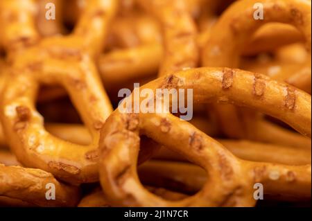 Crispy bread straws with salt, close-up, selective focus, top view ...