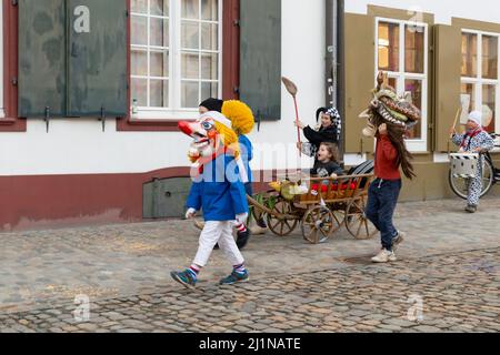 Basel, Switzerland - February 21. Group of children in carnival ...