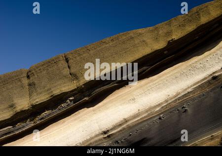 Strata formed by different volcanic eruptions Stock Photo - Alamy