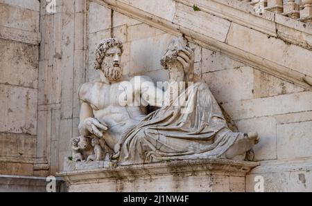 A picture of a statue of the Tiber river God that decorate the entrance ...