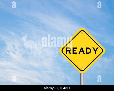 Yellow transportation sign with word ready on violet color sky ...