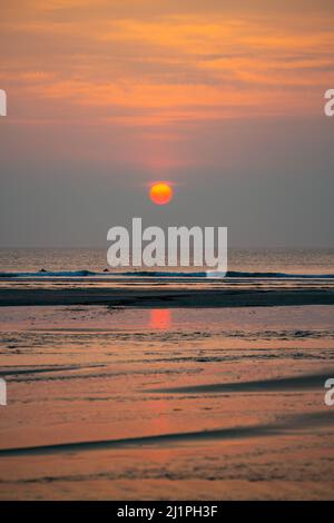 Sunset over Perranporth Beach in Cornwall, uk Stock Photo - Alamy