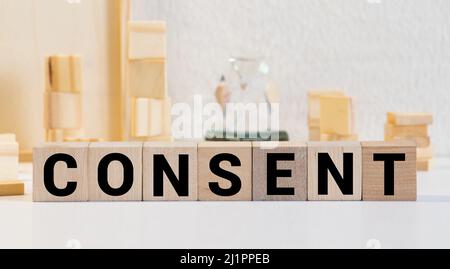 Consent - word from wooden blocks with letters, consent concept, on ...