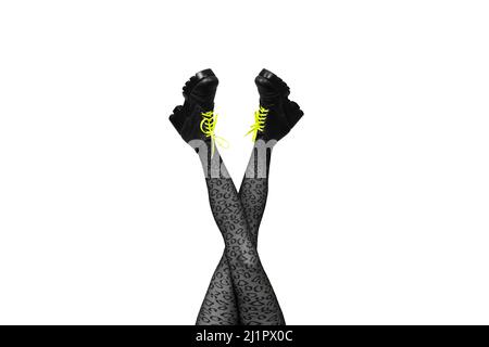 gray boots with yellow laces on a white background Stock Photo - Alamy