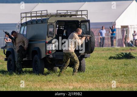 Soldier special forces of Czech army in white camouflage with sniper ...