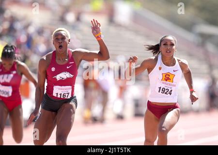 Celera Barnes of Southern California (right) celebrates with teammate ...