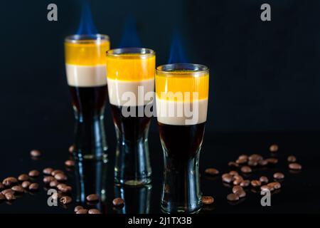 B-52 cocktail flambe (flamed) - layered shot composed of coffee liqueur ...