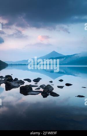Schiehallion reflected in Loch Rannoch at dawn, Perthshire, Scotland ...