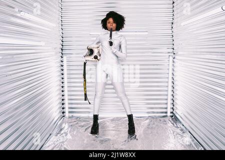 Brave serious-looking female african american femenist look from under ...