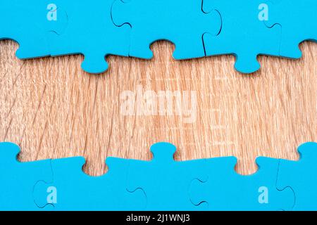 Blue puzzle border with copy space Stock Photo - Alamy