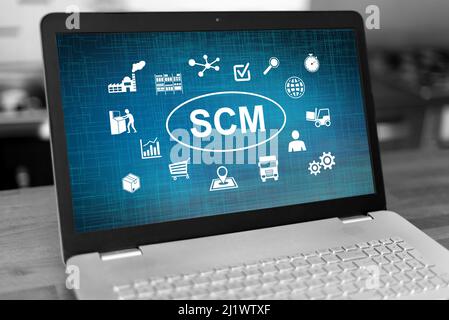 Laptop screen with scm concept Stock Photo - Alamy