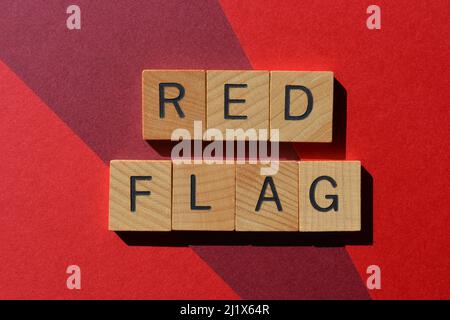 Red Flag, words in wooden alphabet letters isolated on red background ...