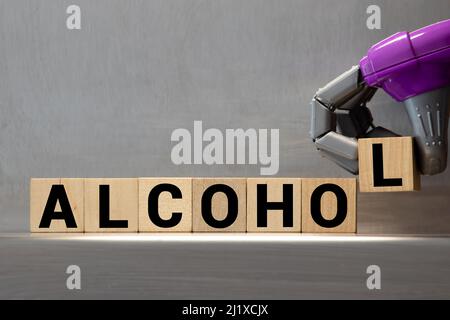 alcohol word written on wood block. alcohol text on table, concept ...