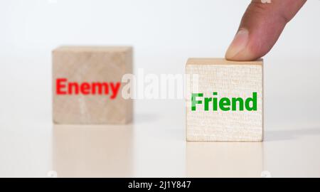ENEMY word written on wood block Stock Photo - Alamy
