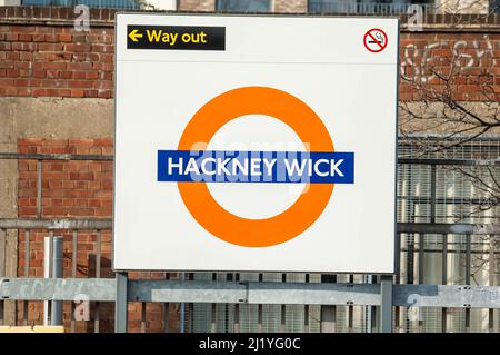 Hackney Wick Station, TFL Overground sign close up detail with Olympic ...