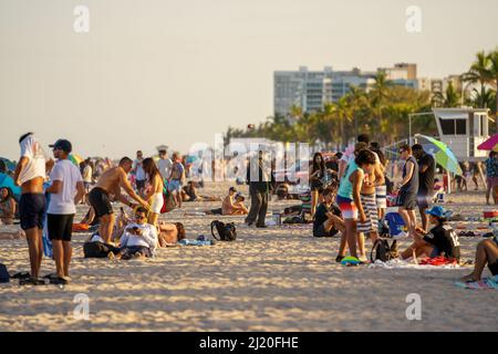 Fort Lauderdale, FL, USA - March 27, 2022: Families on the beach Spring ...