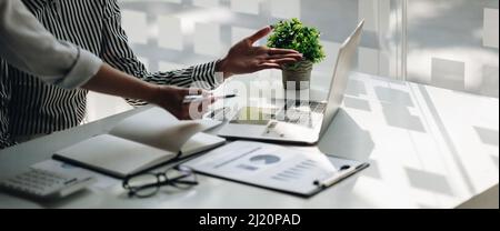 Close up Business people meeting to discuss the situation on the market ...