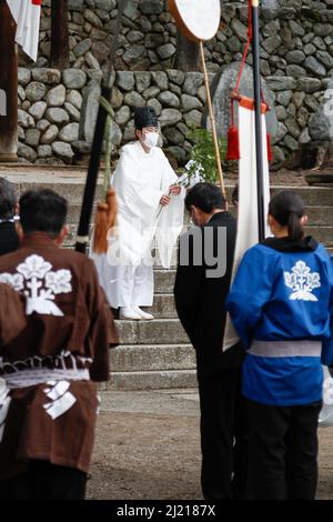iida, nagano, japan, 2022/24/03, Shintoist priest greeting the crowd ...