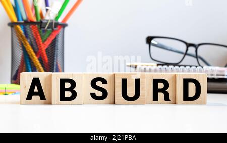 ABSURD word made with building blocks, concept Stock Photo - Alamy