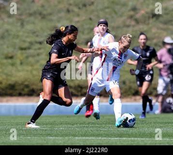 Angel City FC defender Madison Hammond (99) falls against OL Reign ...