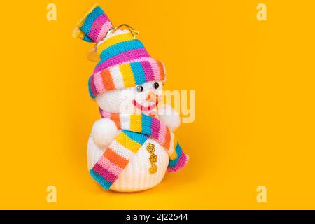 Handmade foam snowman on yellow background Stock Photo - Alamy