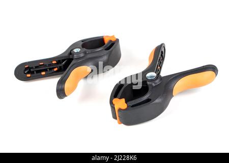 Black and orange spring clamp isolated on white background. Set of ...