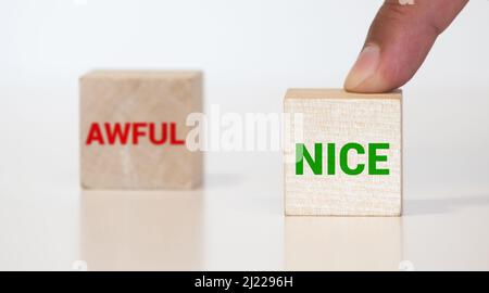 Awful and nice antonyms word on block. Concept Stock Photo - Alamy
