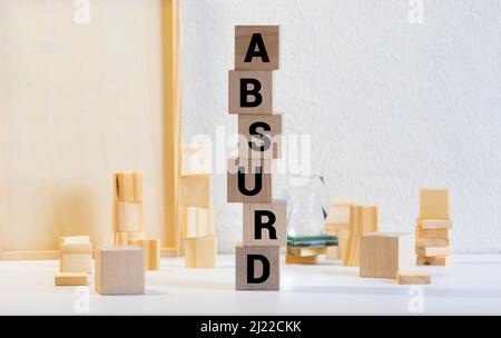 ABSURD word made with building blocks isolated on white Stock Photo - Alamy