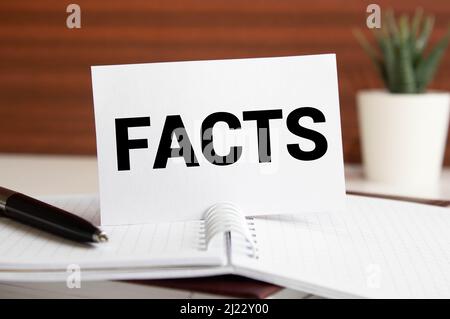 Facts word on card index paper Stock Photo - Alamy