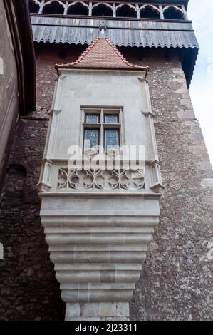 Beautiful design of a small window of a castle Stock Photo - Alamy