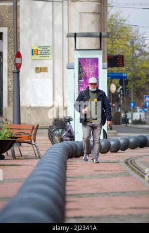 Timisoara, Romania - April 17, 2021: People walking on the street. Real ...