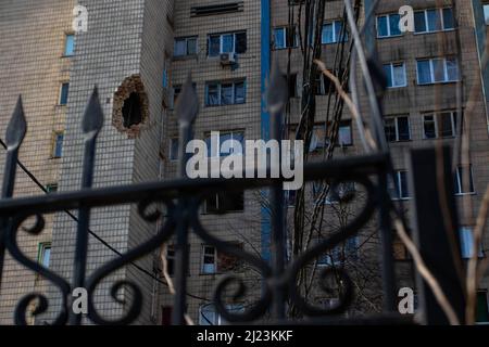 A damaged apartment building in Boyarka. Russian forces continue their ...