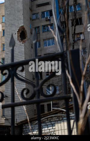 A damaged apartment building in Boyarka. Russian forces continue their ...