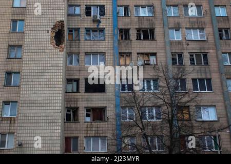 A damaged apartment building in Boyarka. Russian forces continue their ...