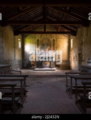 Decaying interior of an abandoned building with peeling paint and ...